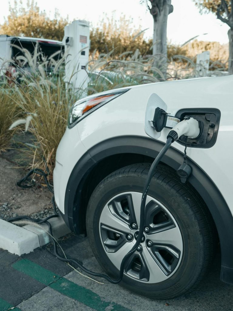 Hybrid vs. Electric Car in 2026: Which Should You Buy? | Carzing